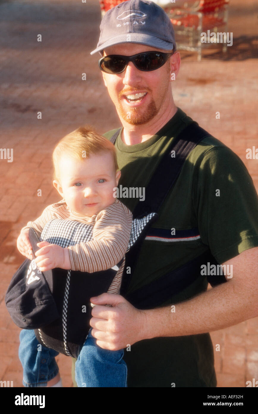 Father smiling with his son smiling portrait Stock Photo - Alamy