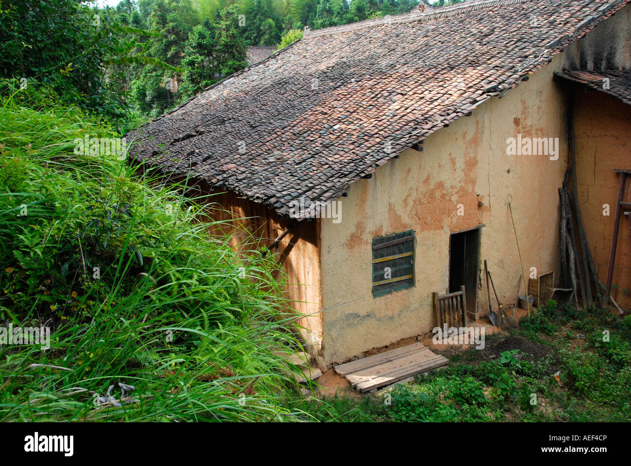 A simple old farm house in a village in hunan, China Stock Photo - Alamy