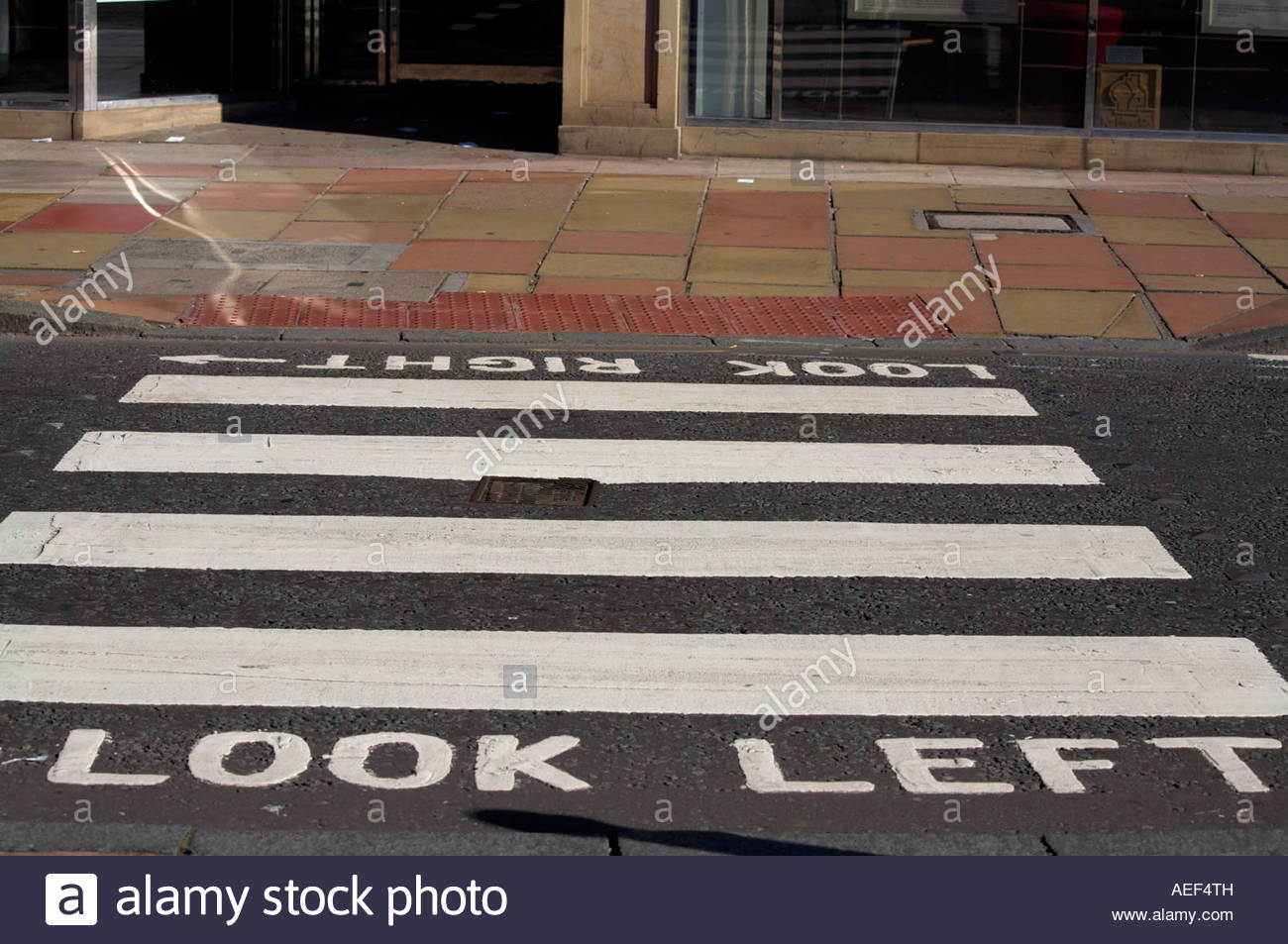 Look left road markings Stock Photo - Alamy