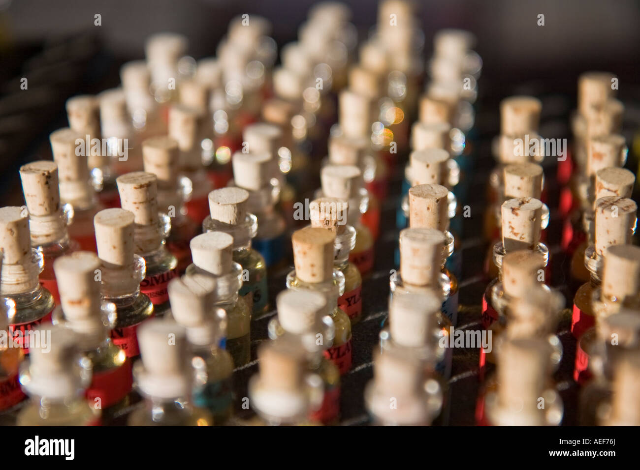 Several small essence bottles with cork Stock Photo - Alamy
