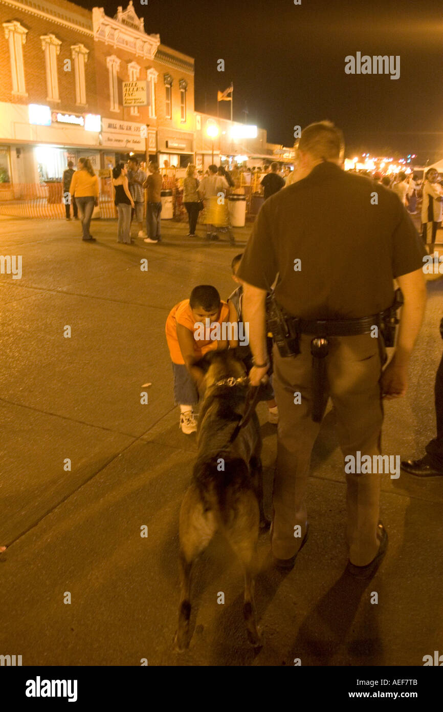 Children with police dog late at night during street dance Saline ...