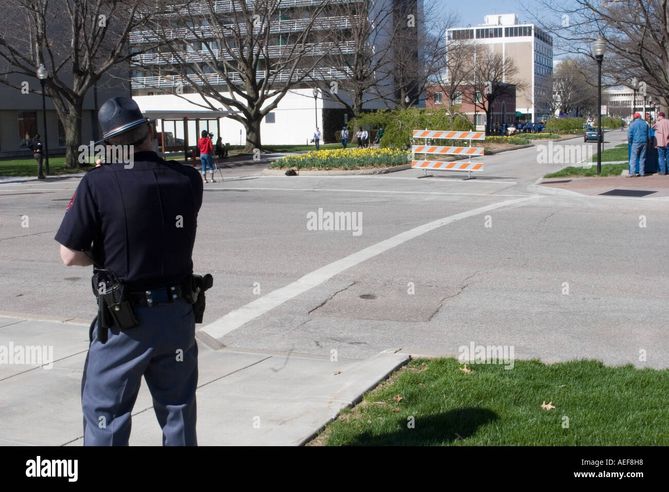 Nebraska State Trooper talking on the radio just before the arrival of ...