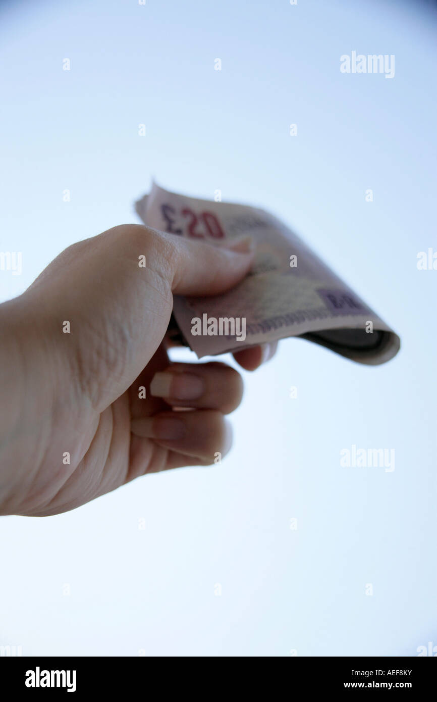 Hand over money sterling hi-res stock photography and images - Alamy