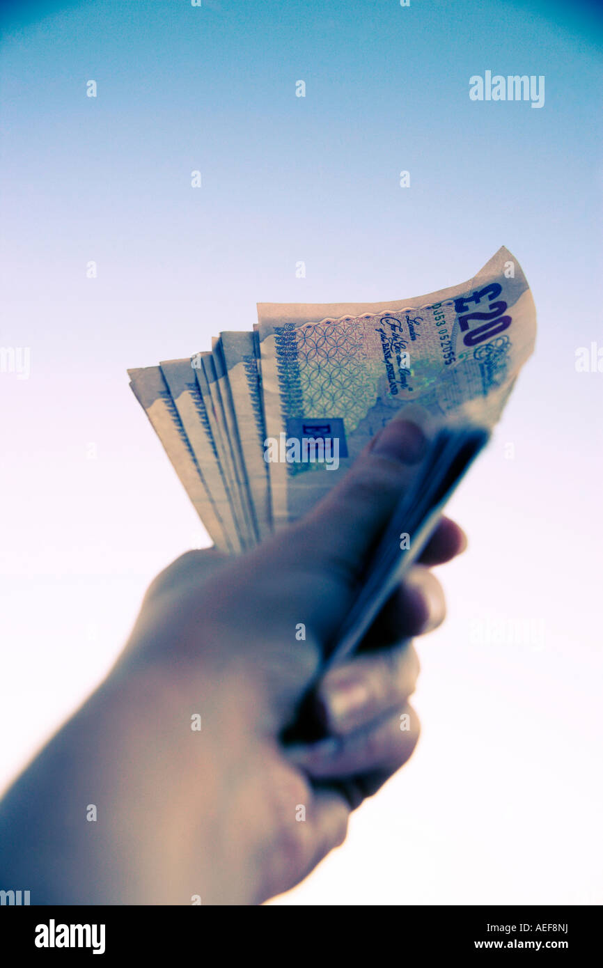 Hand over money sterling hi-res stock photography and images - Alamy