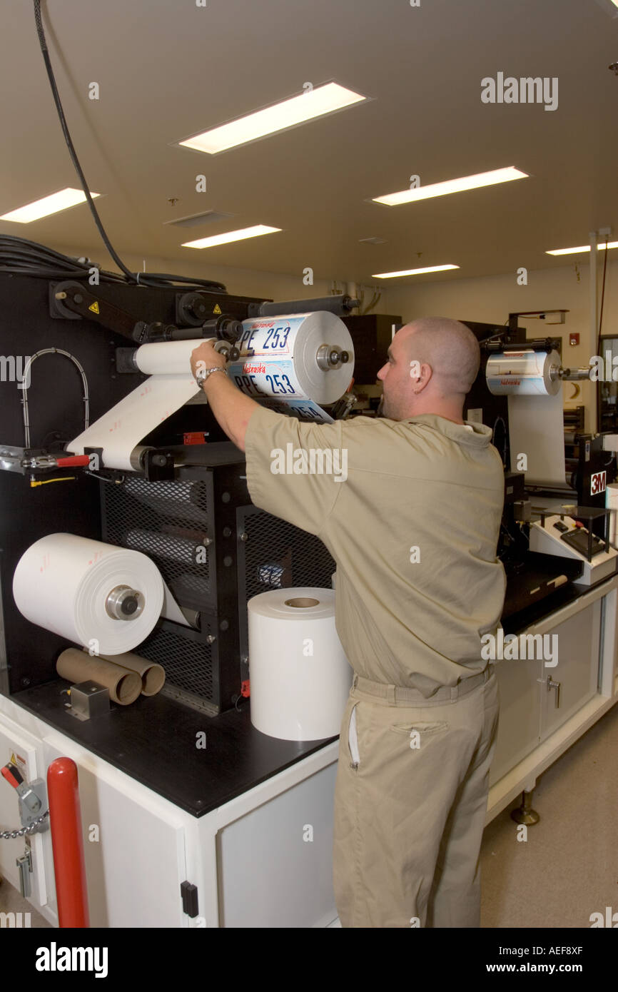 License plate manufacturing Replacing empty roll in priting machine ...