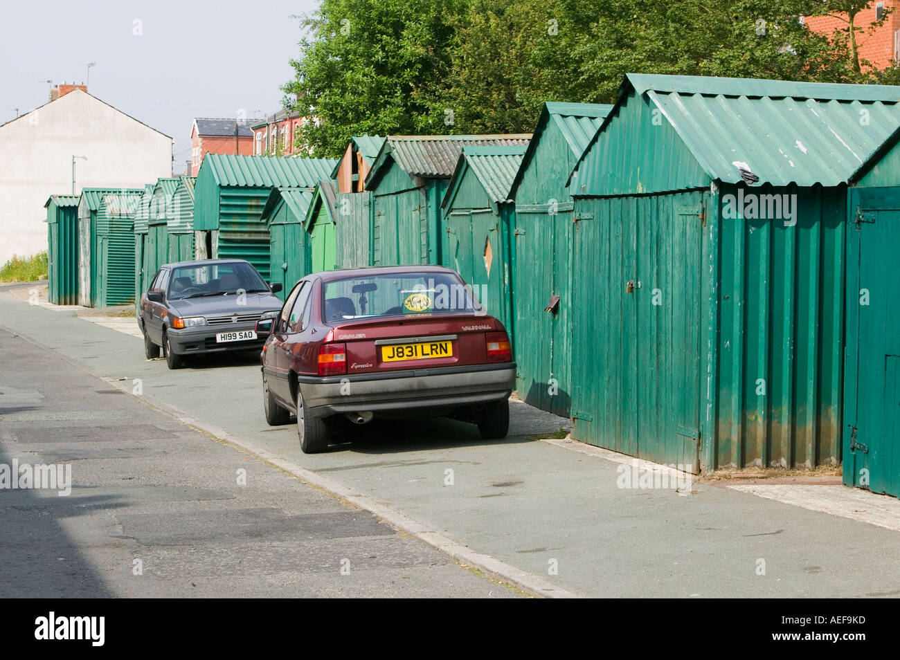 garages on the back streets of Blackburn, Lancashire, UK Stock Photo ...