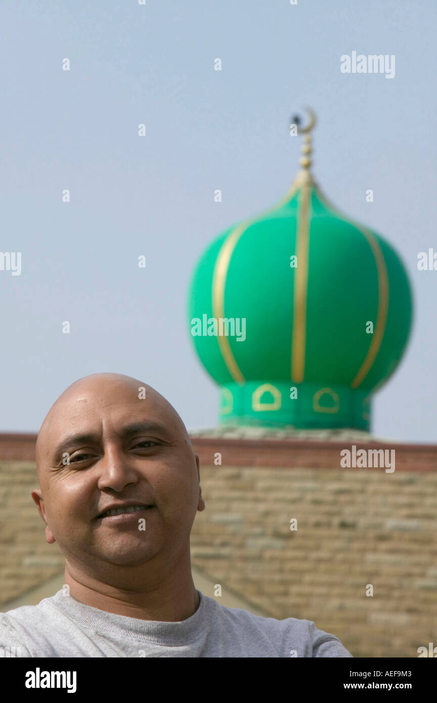 pakistani man in front of a mosque on the streets of Blackburn ...