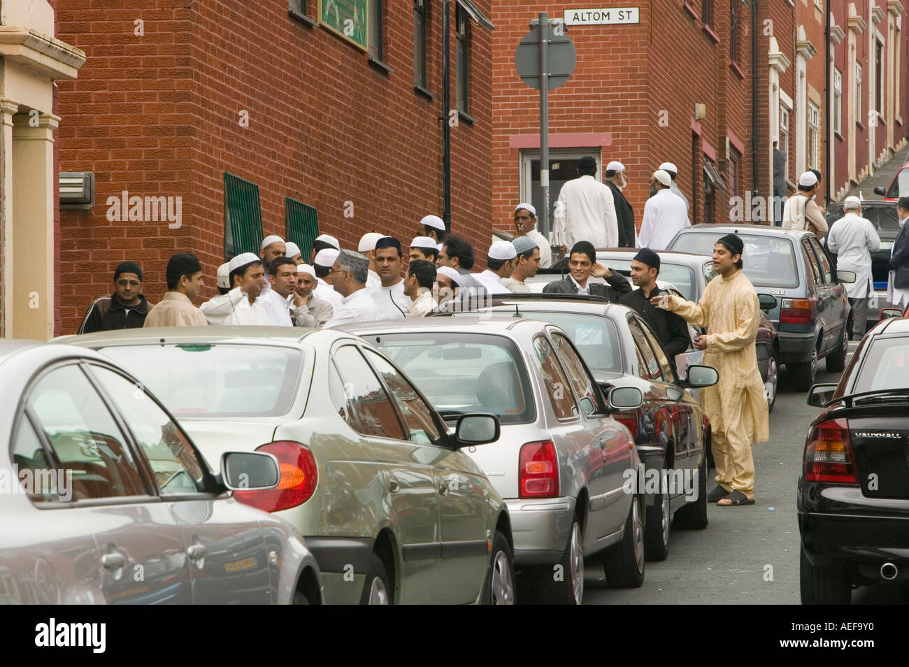 muslims gathering on the street after friday prayers on a street in ...
