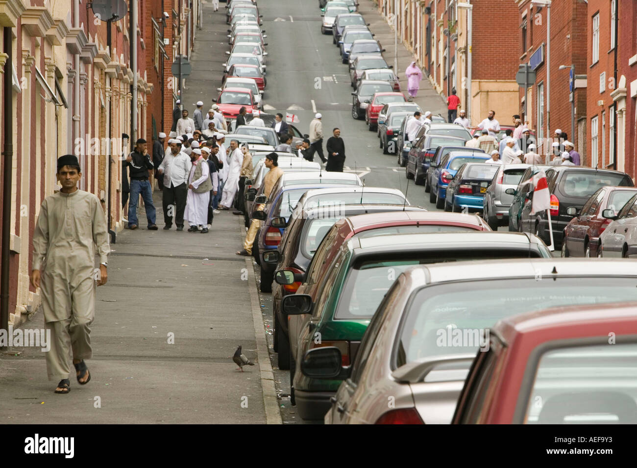 muslims gathering on the street after friday prayers on a street in ...