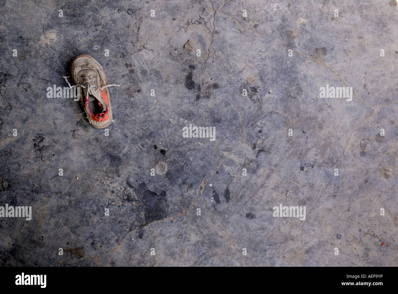 Single child's shoe Stock Photo - Alamy