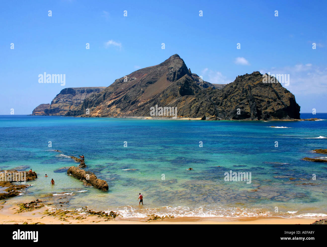 tropical beach with island ahead Stock Photo - Alamy