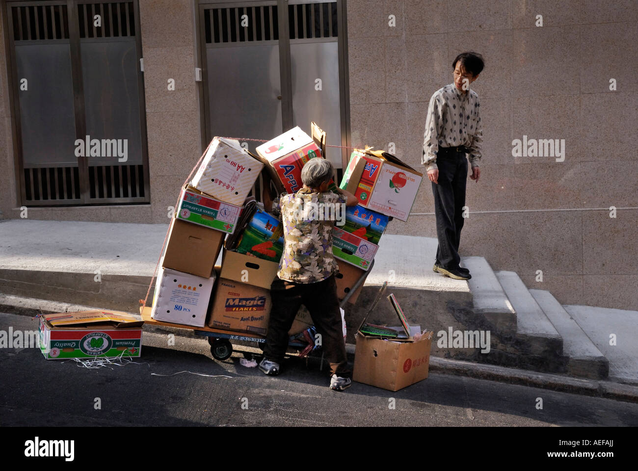 Garbage lady on Aberdeen Street in the old centre of Hong Kong Stock ...