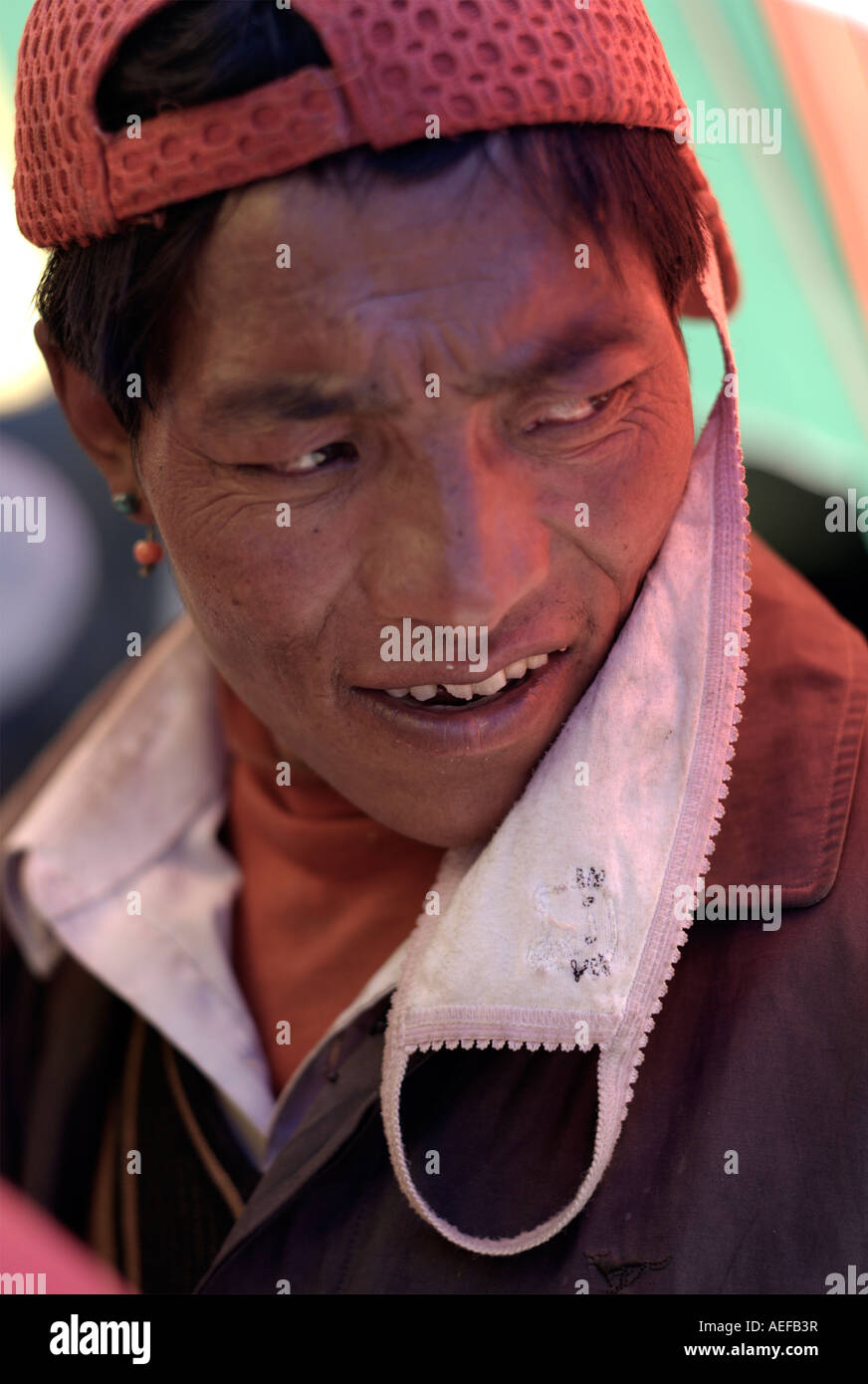 Portrait of Tibetan man Stock Photo - Alamy