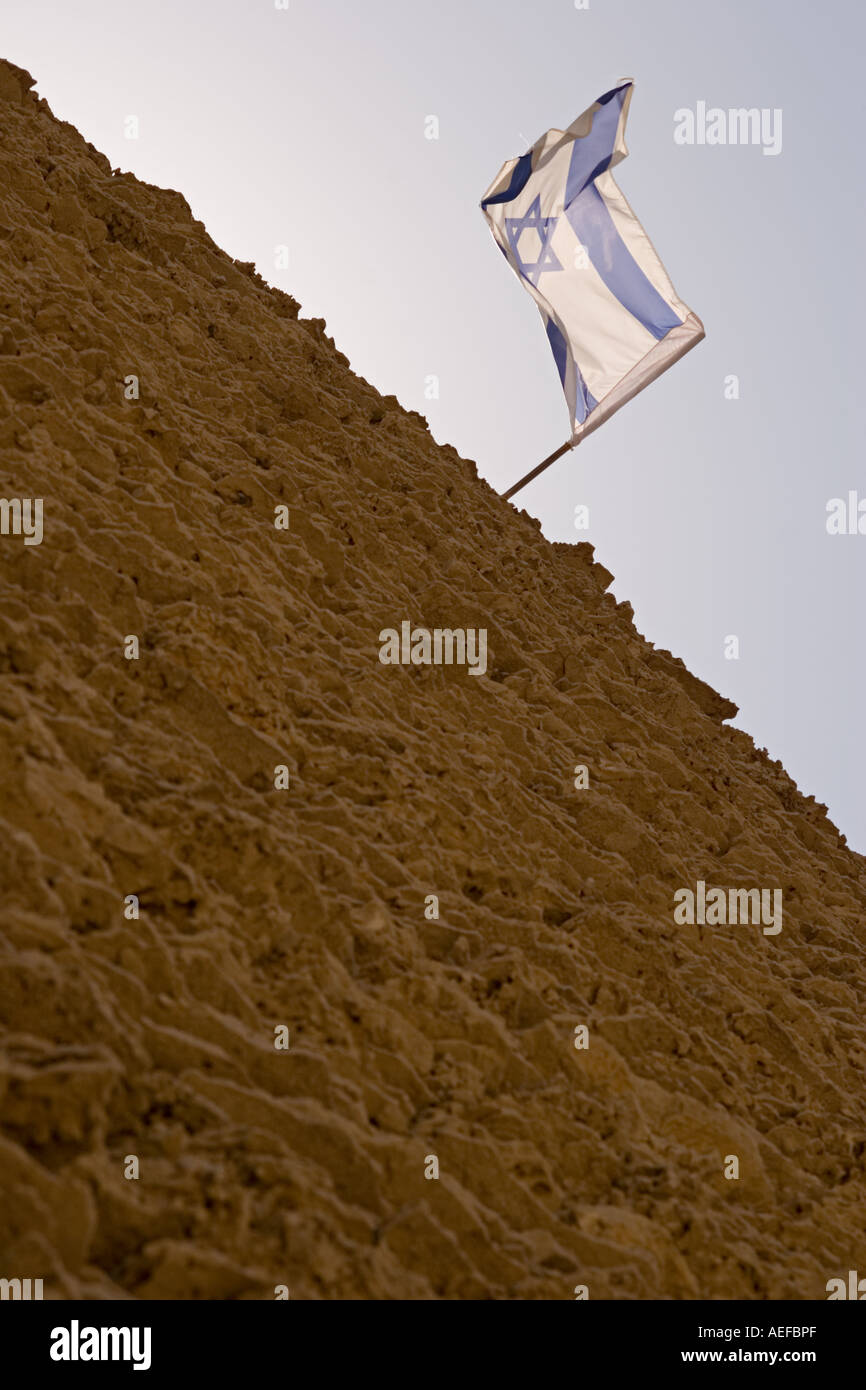 Stock photo of an Israeli flag with the Star of David emblem centered ...