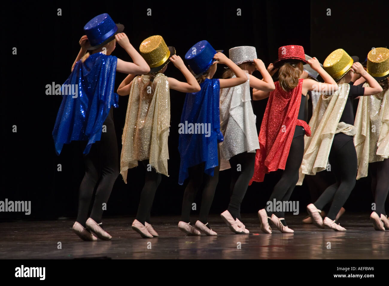 Stock photo of young dancers performing on stage in bright and shiny ...