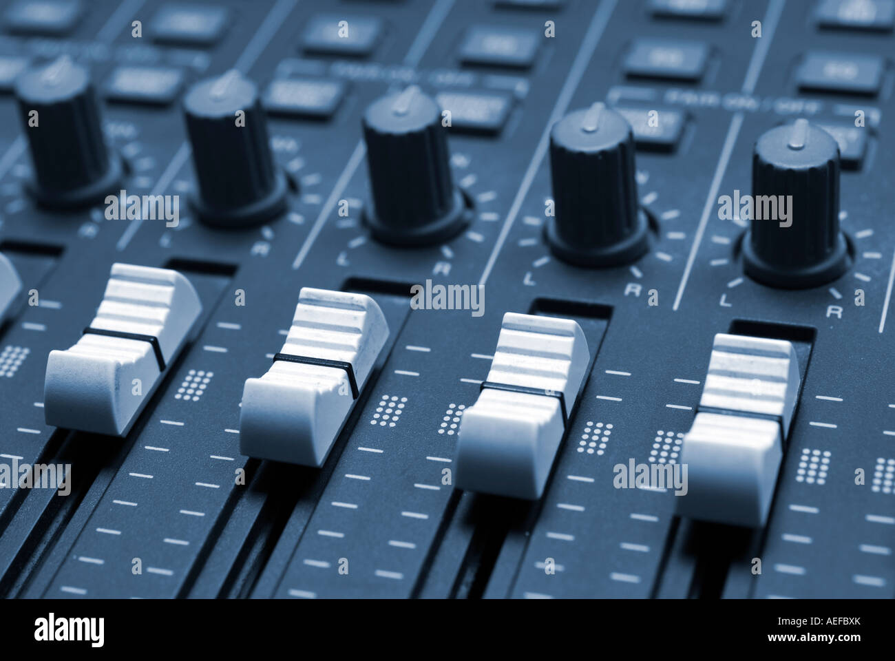 Recording mixing desk up close Stock Photo - Alamy
