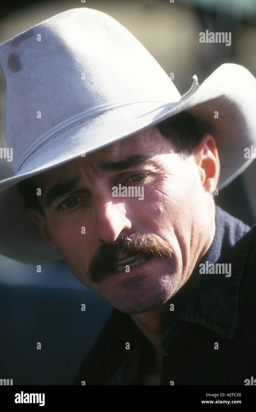 Closeup of a genuine American cowboy in a contemplative mood. Montana ...