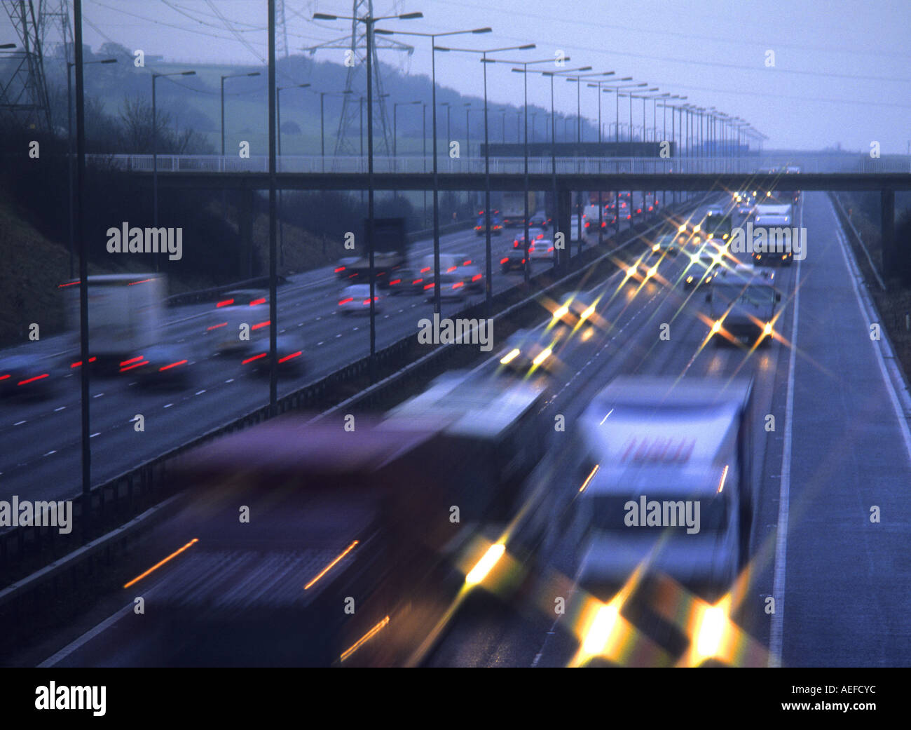 heavy traffic travelling on the m62 motorway at dusk yorkshire uk Stock ...