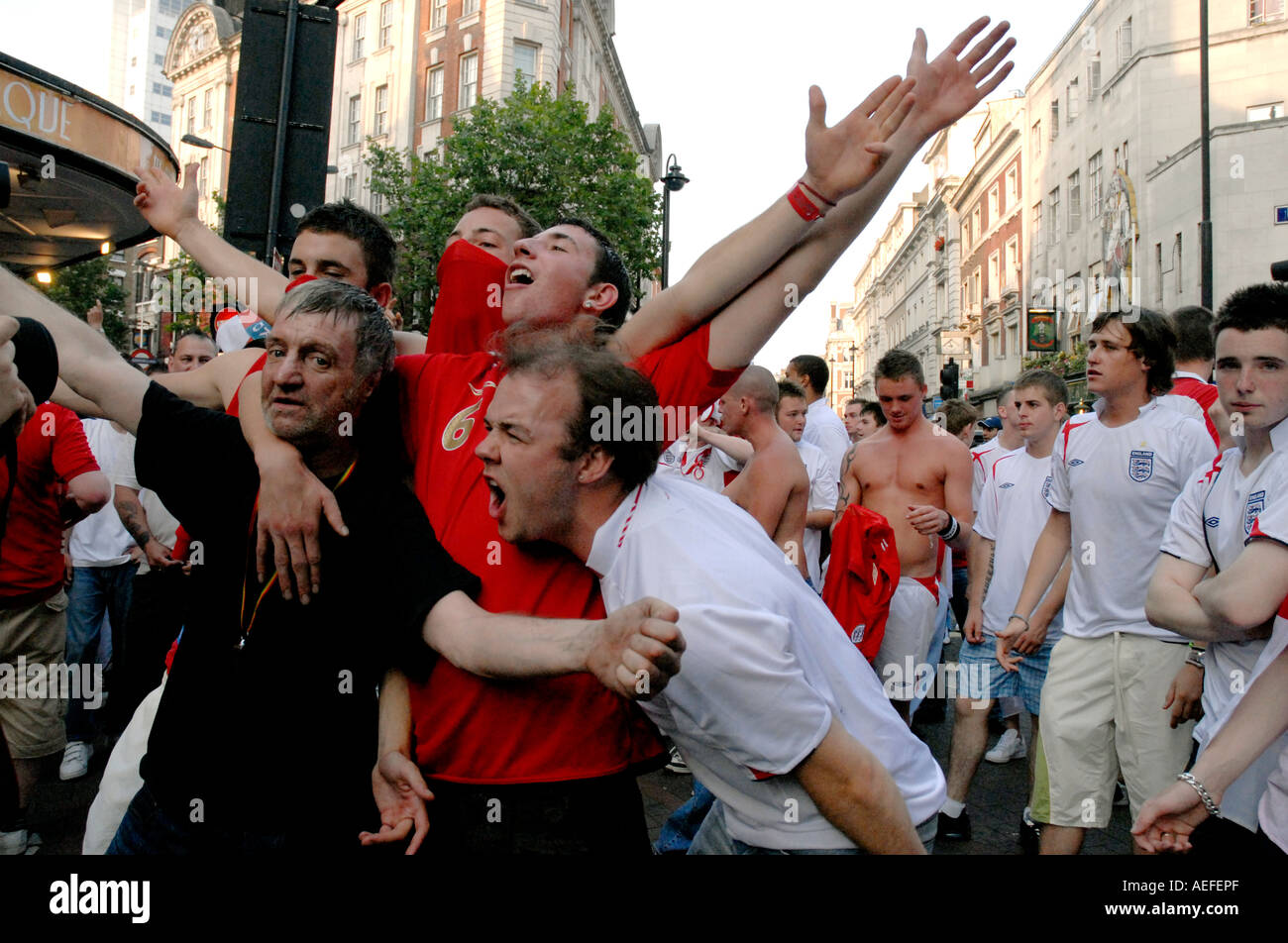 Group of football fans taunting the police by Leicester Square in ...