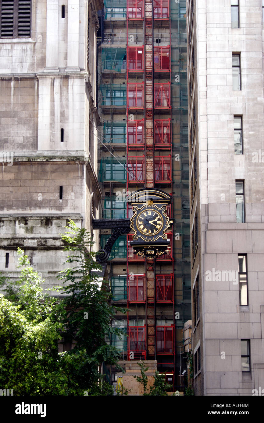 Clock on building facade Monument London Stock Photo - Alamy