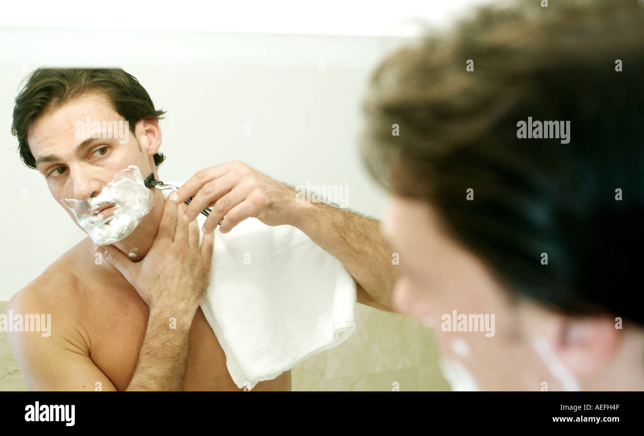 Man shaving Stock Photo - Alamy