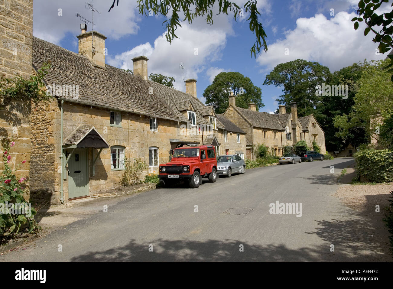 Typical mellow stone houses in Cotswold village of Stanton UK Stock ...