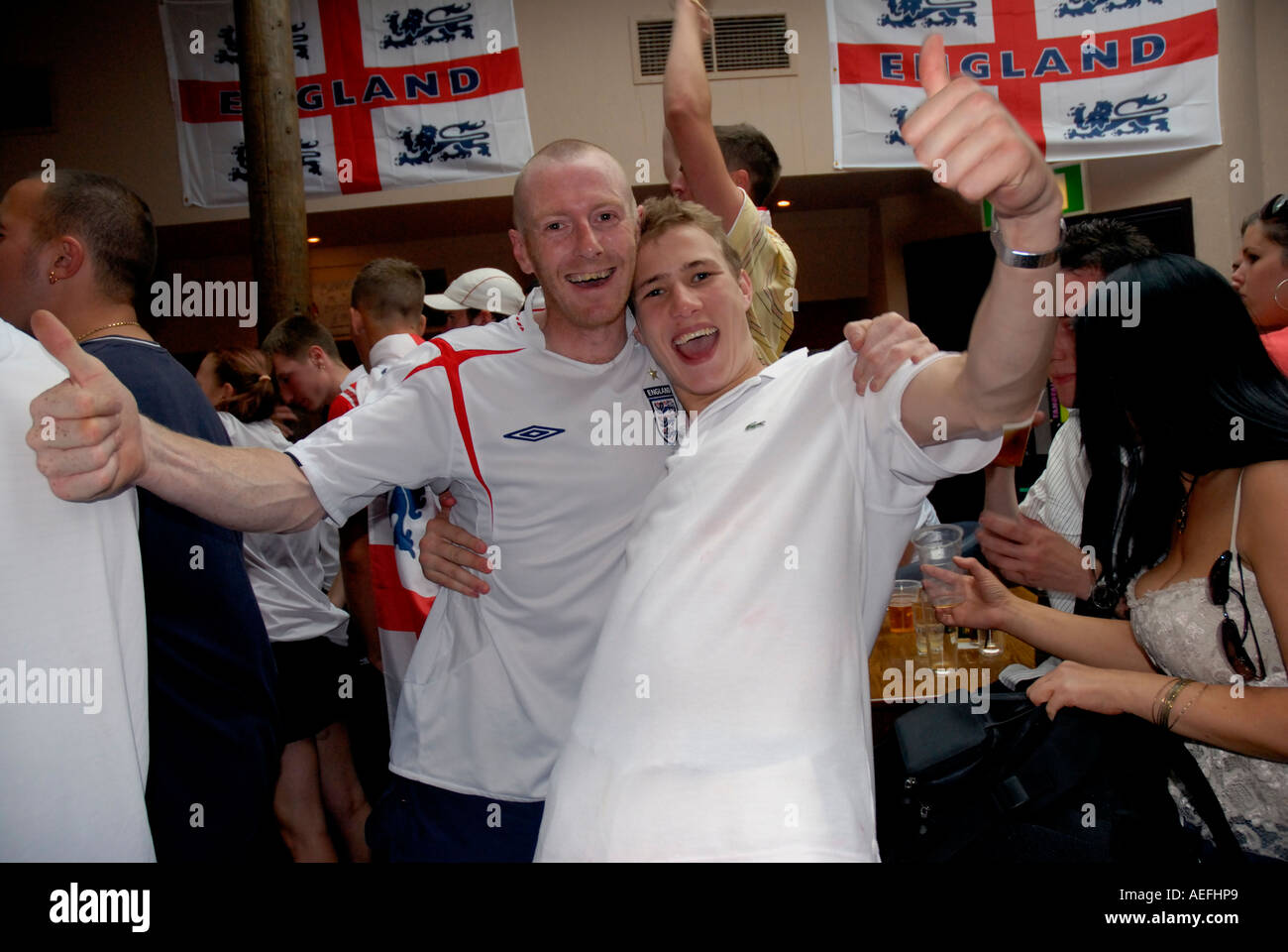 Sport football fans supporters celebrating football shirts drinking ...