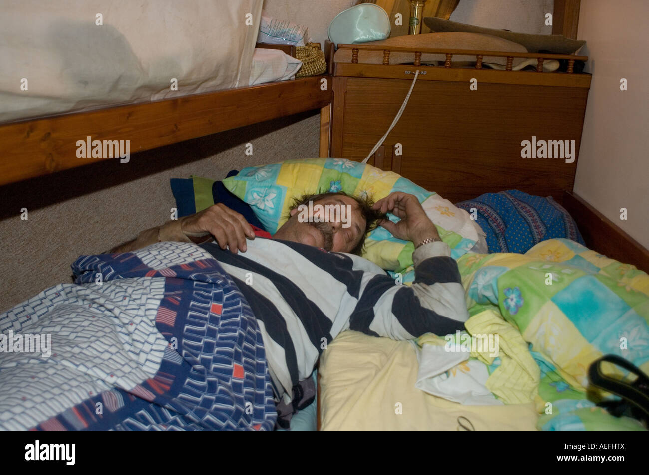 captain Jerome Poncet sleeping on his sailboat Golden Fleece western ...