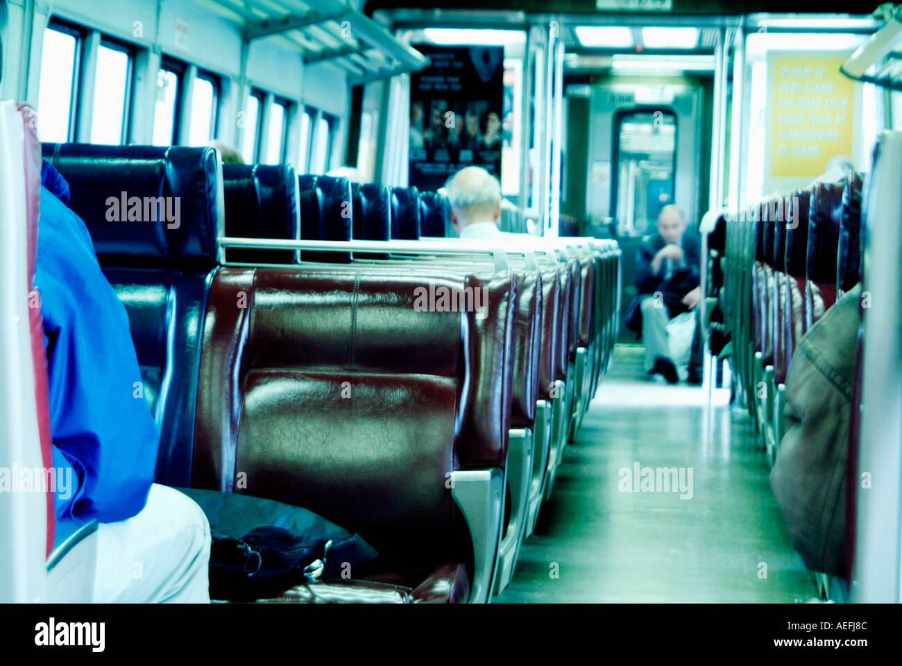 Train interior with passengers Stock Photo - Alamy