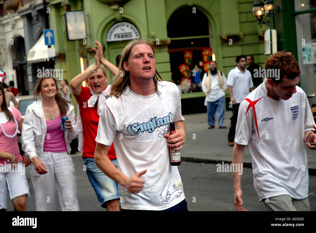 English football fans running through streets of central London after ...