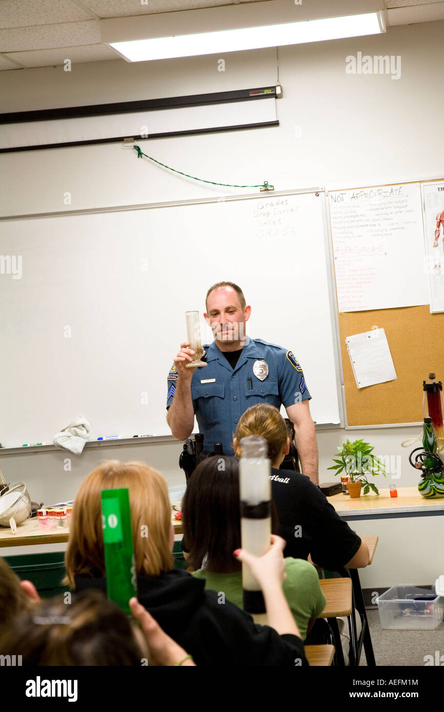 Police officer Mercier is giving a presentation on narcotics to a ...