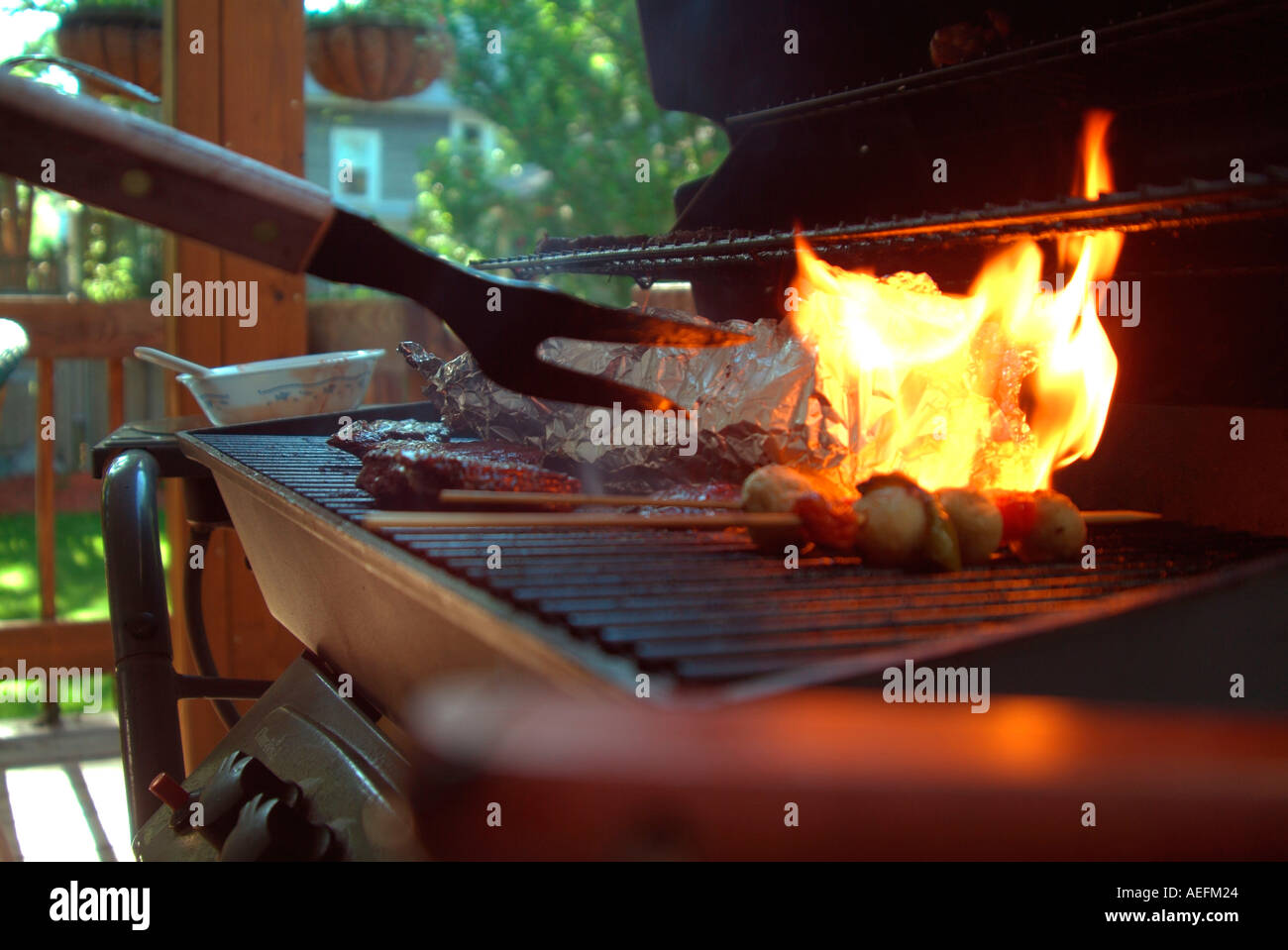 Food being cooked on a barbecue Stock Photo - Alamy