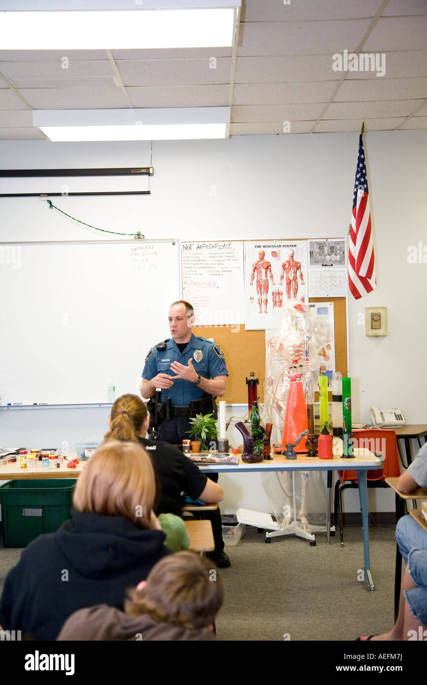Police officer Mercier is giving a presentation on narcotics to a ...