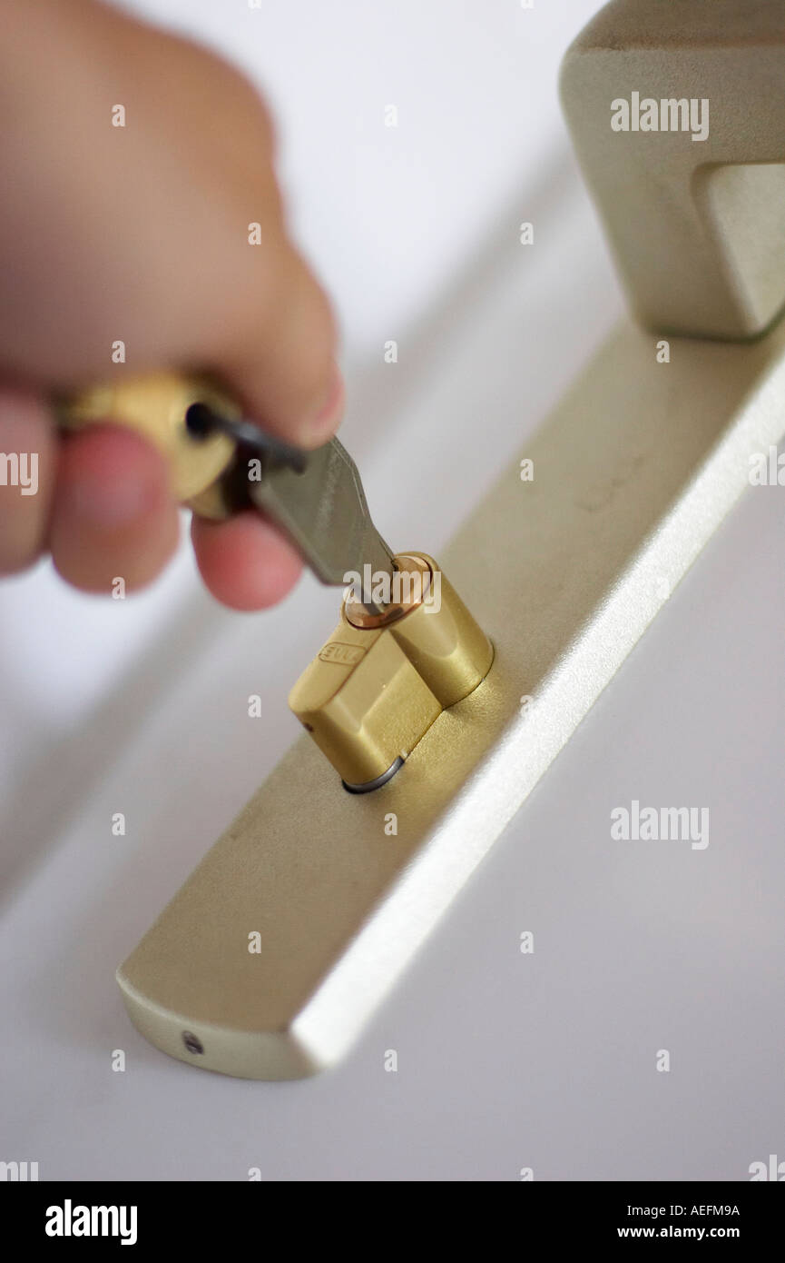 unlocking a door Stock Photo - Alamy