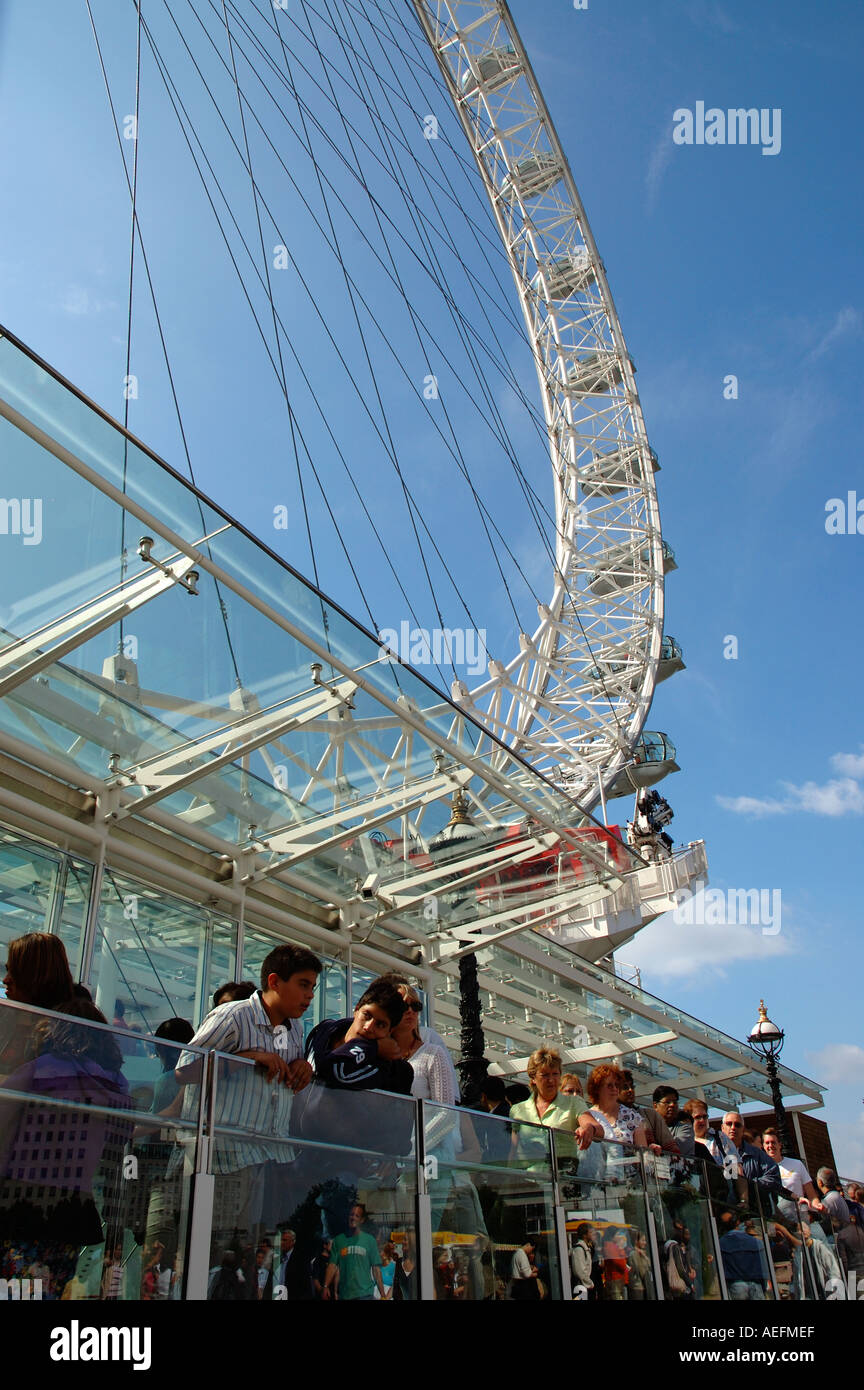 The london eye with people queuing hi-res stock photography and images ...