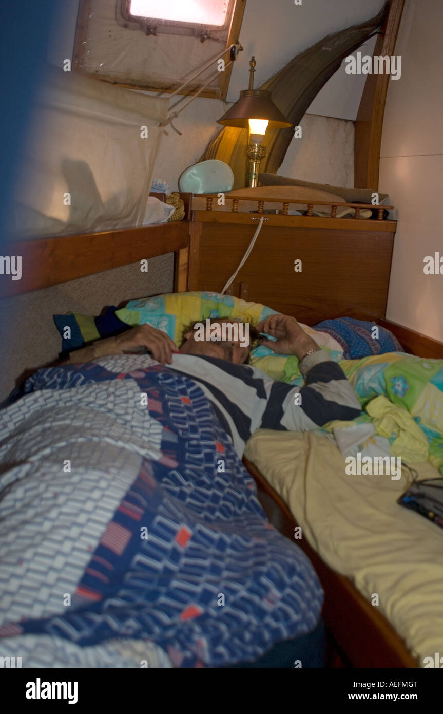 captain Jerome Poncet sleeping on his sailboat Golden Fleece western ...