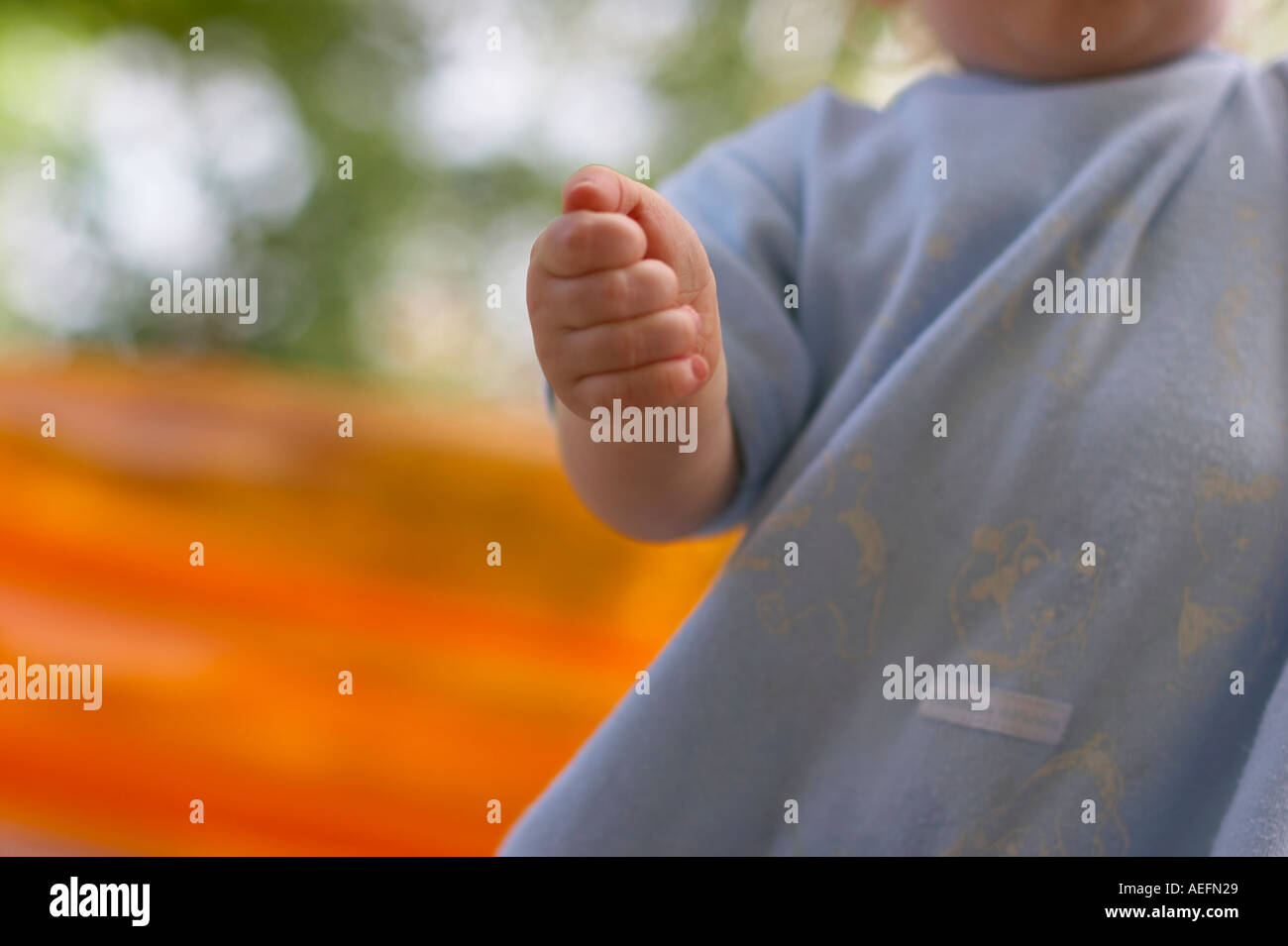 baby showing his fist Stock Photo - Alamy