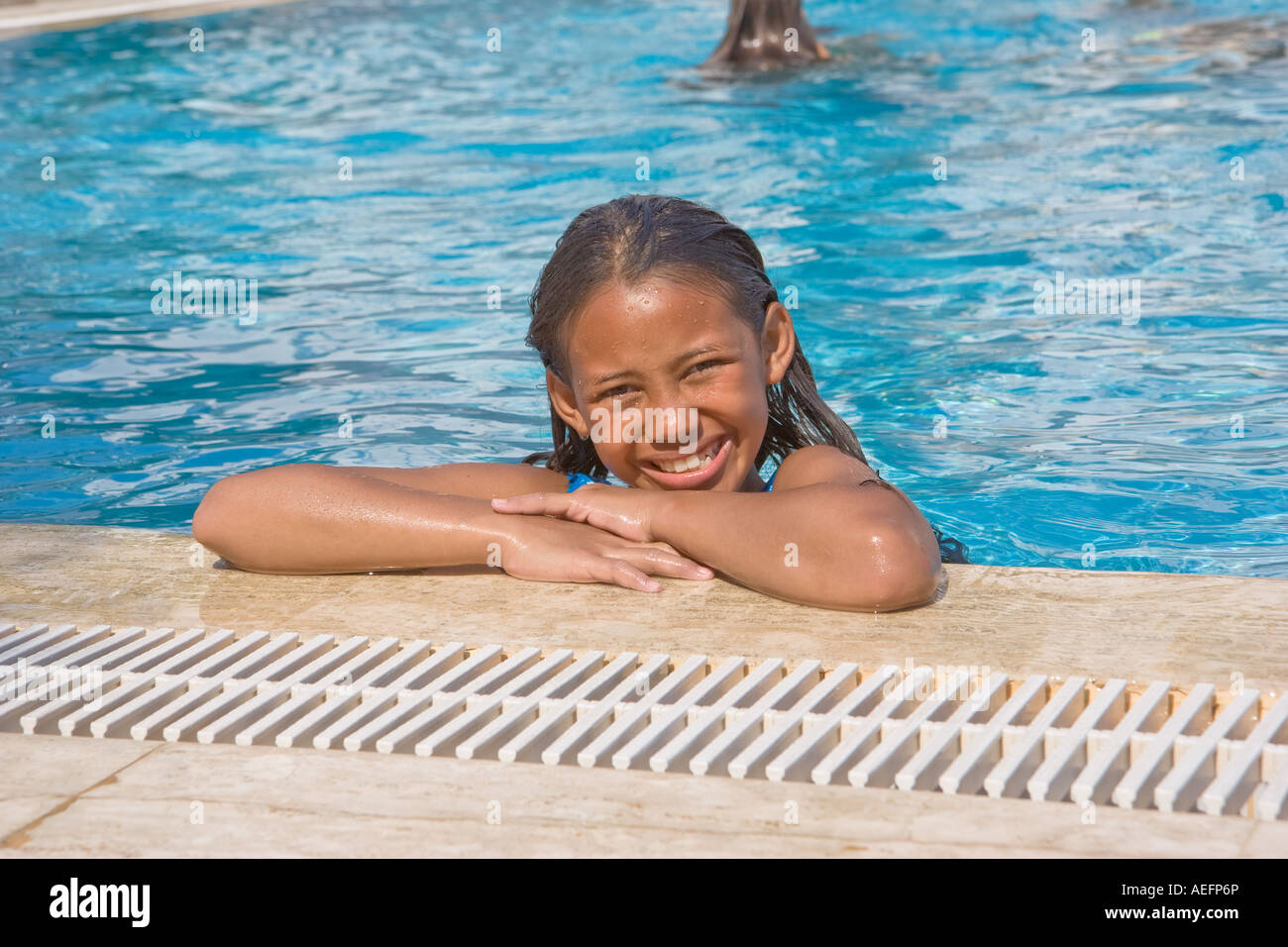 Girl posing poolside in hi-res stock photography and images - Alamy