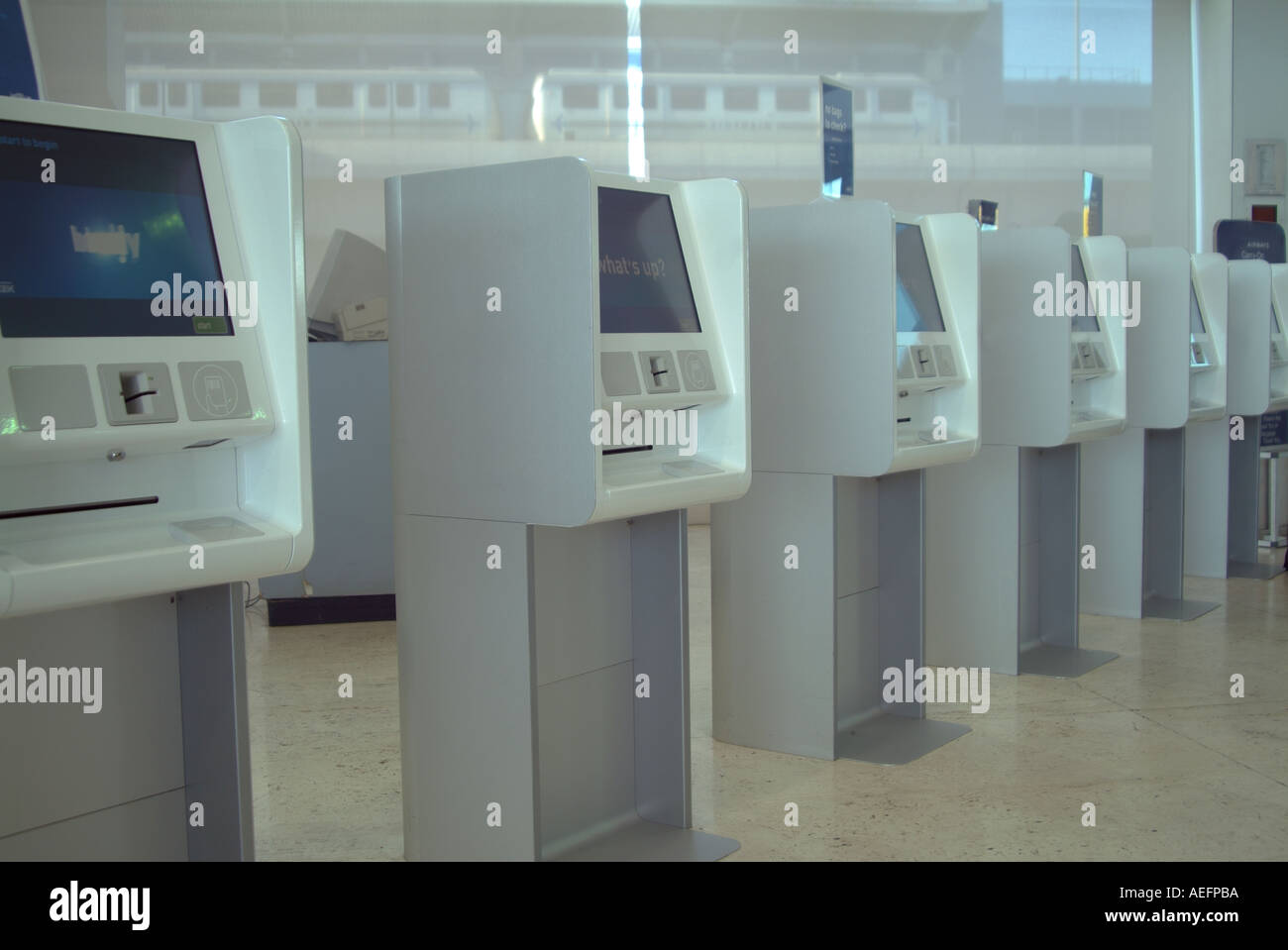 Airport ticket kiosks Stock Photo - Alamy