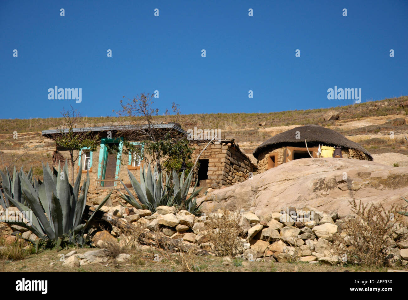 Rondavel with thatched roof plus brick house up in the mountains near ...