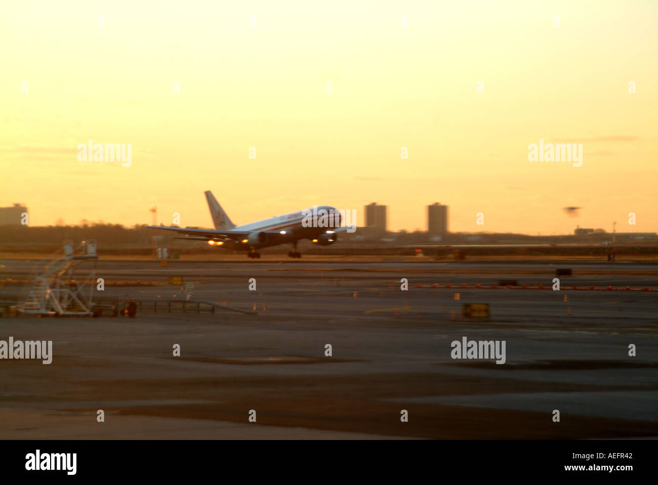 Airplane on runway Stock Photo - Alamy
