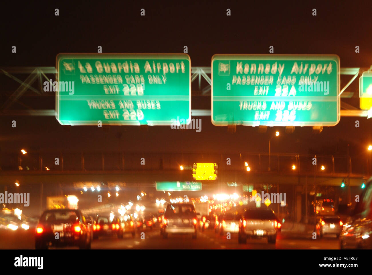 New York City airport exit signs Stock Photo - Alamy