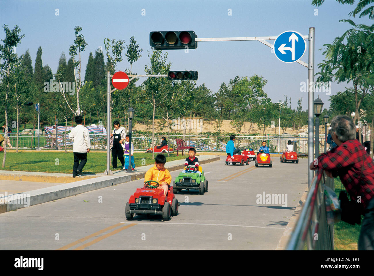 Children driving Cart at Chaoyang park beijing Stock Photo - Alamy