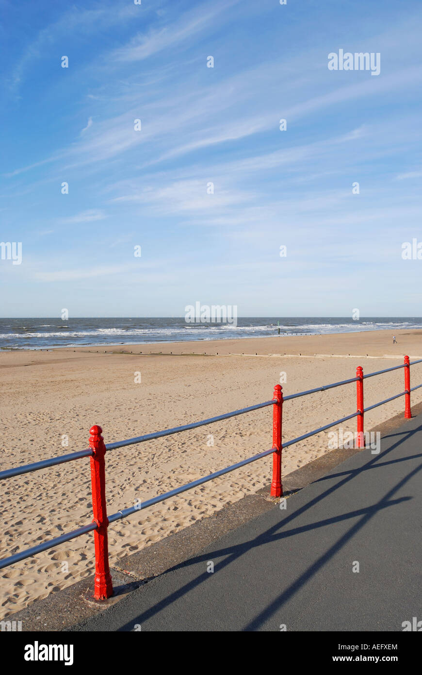 Painted railings on the promenade in the coastal resort town of Rhyl ...