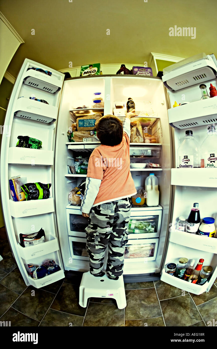 Raiding refrigerator hi-res stock photography and images - Alamy
