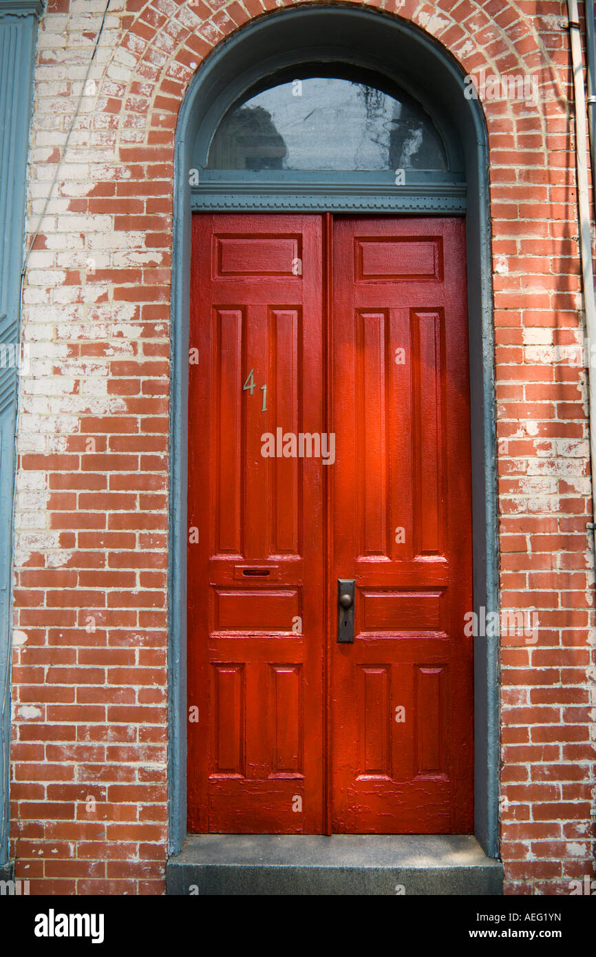 Tall Red Double Doors with Half Circle Transom in Patched Brick ...