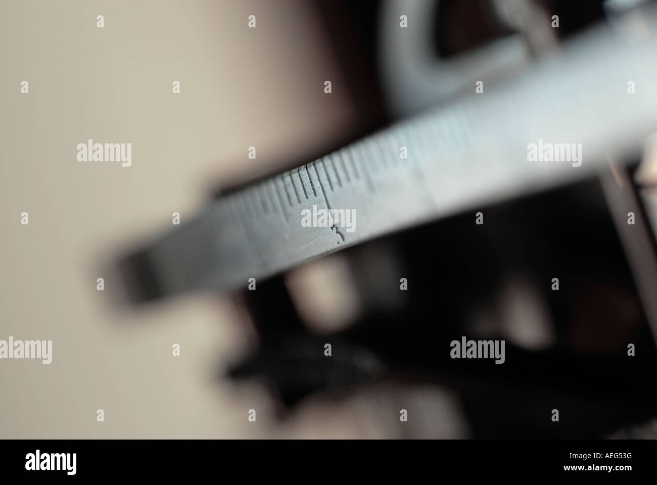 Slider of a mechanical balance scale marking number three Stock Photo ...