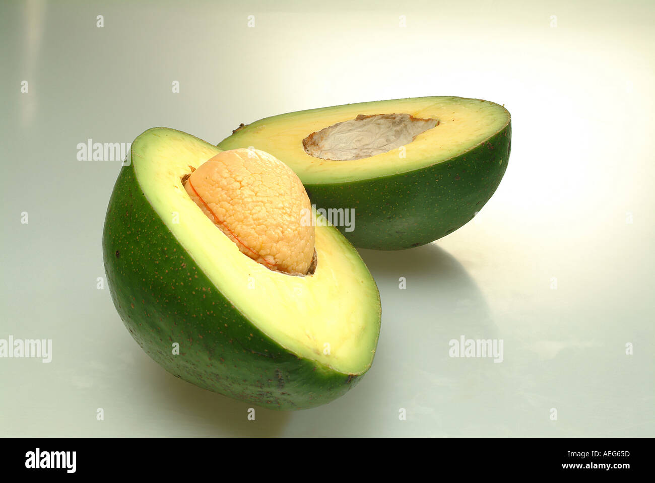 Fruits Vegetables avocado avocadoes green cut open seed oversized ...