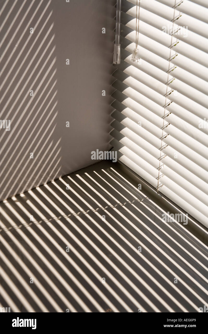interior design shadows cast by venetian blind on sunny day Stock Photo ...
