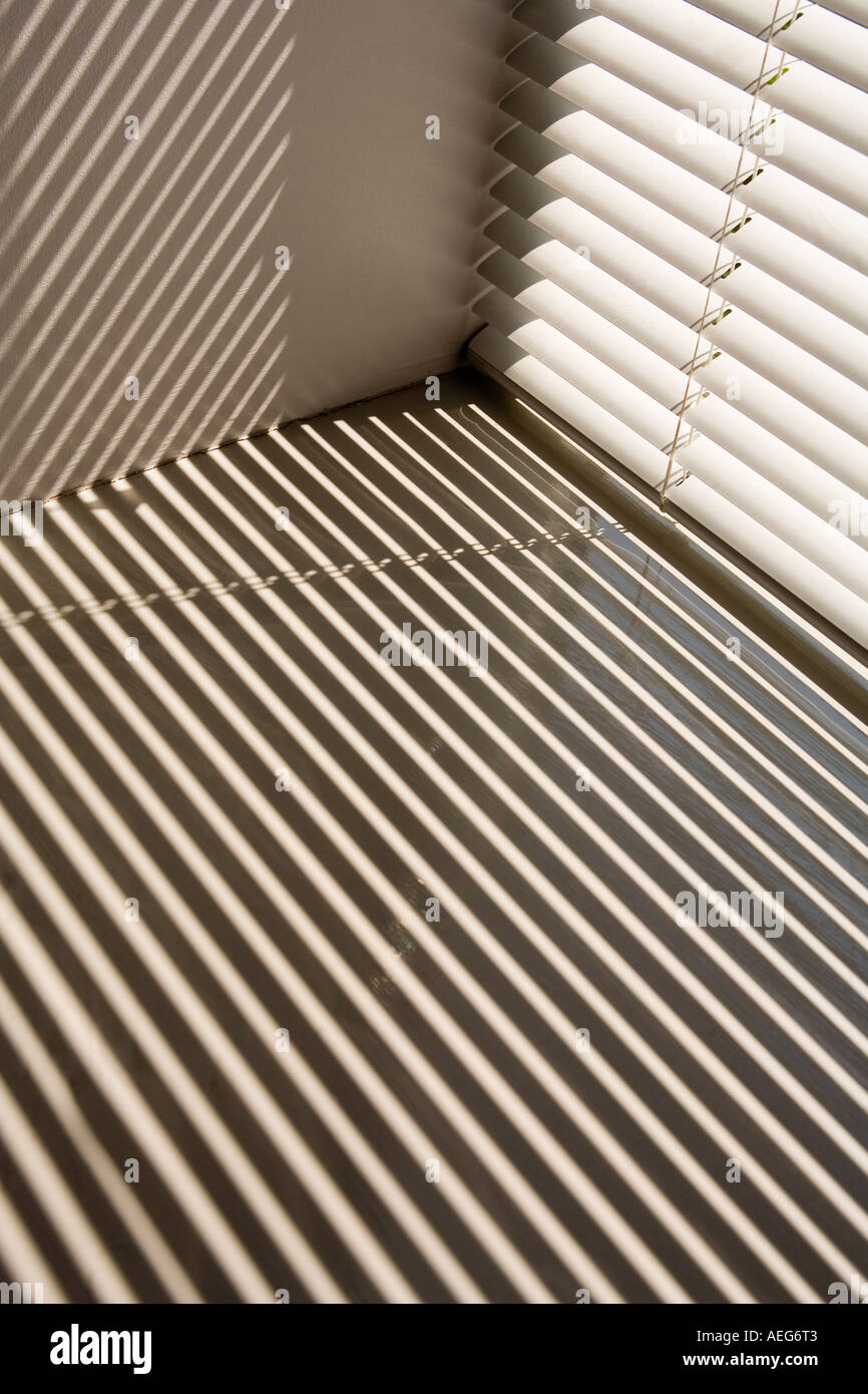 interior design shadows cast by venetian blind on sunny day Stock Photo ...